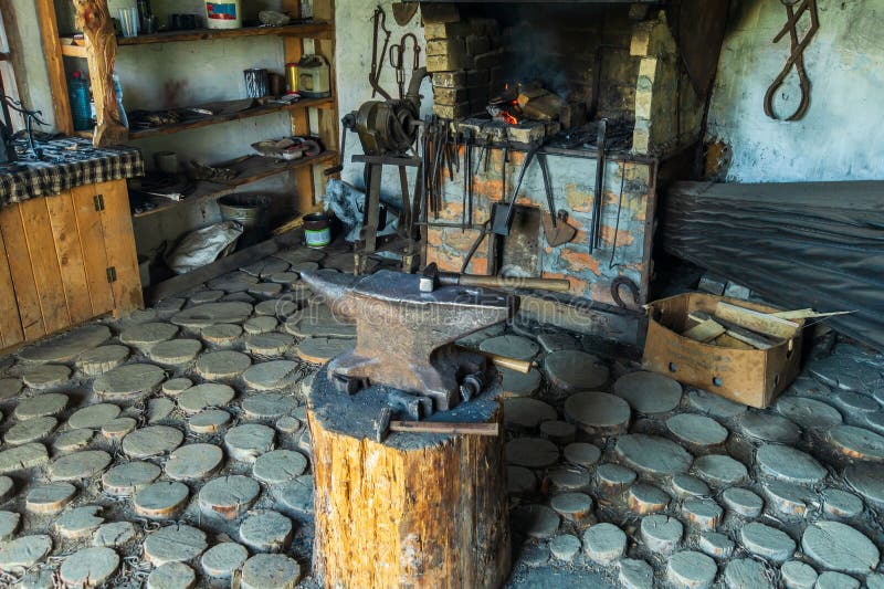 Old Smithy with Fire before Starting Work. Working Environment with ...