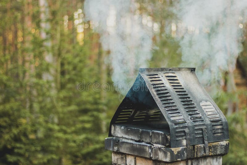 Old Smoky Chimney in the Forest Stock Photo - Image of brick, trees ...