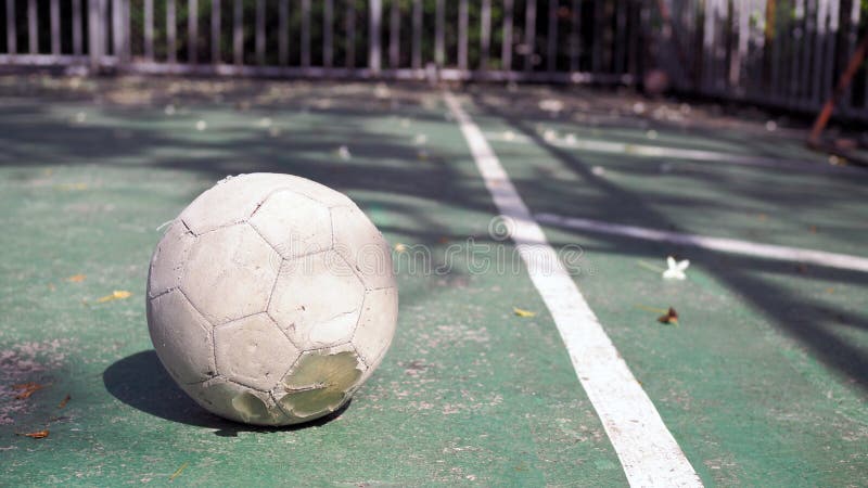Old Soccer Ball. an Old Soccer Ball in the Field. Stock Image - Image ...
