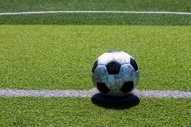 The Old Soccer Football on the White Line in the Artificial Turf Stock ...