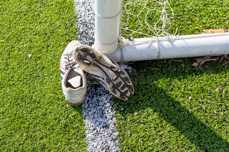 Old Soccer Shoes on Artificial Turf Field Stock Photo - Image of fiber ...