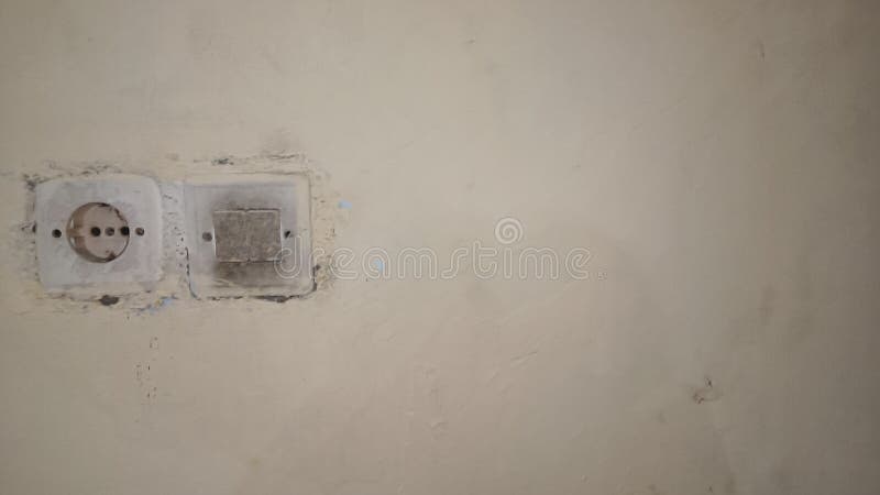 Old Sockets and Switches on the Wall Kuning Stock Photo - Image of ...