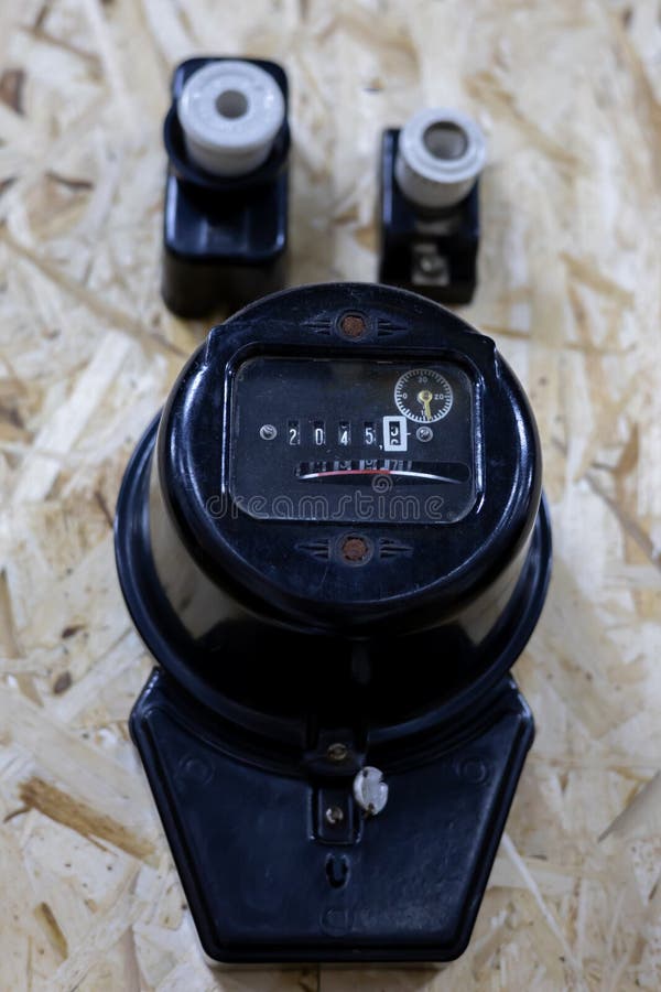 An Old Soviet Black Electric Meter Hangs on the Wall. Retro Items from ...
