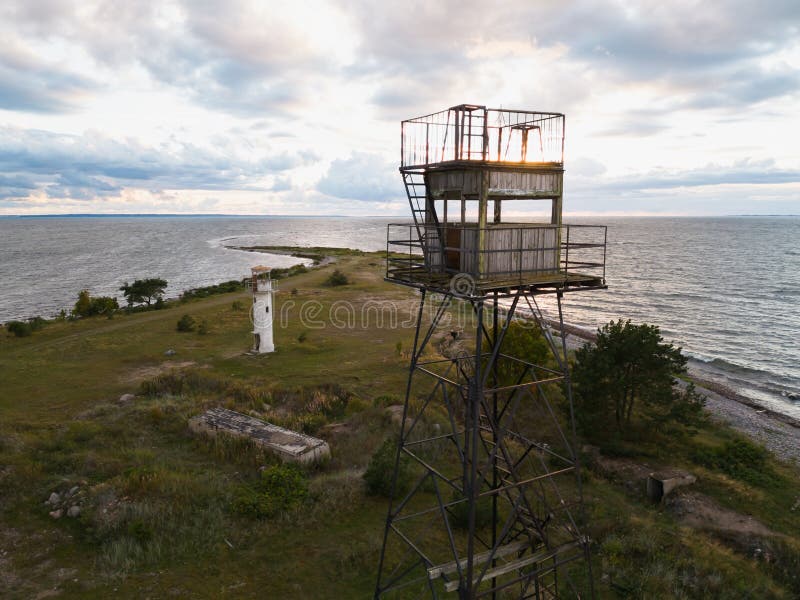 An Old Soviet Border Tower and Lighthouse in Neeme Against a Cloudy Sky ...