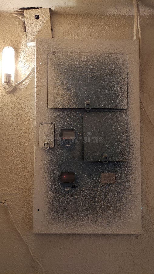 Old Soviet Electric Meter on an Empty Wall with a Lamp. Front View ...