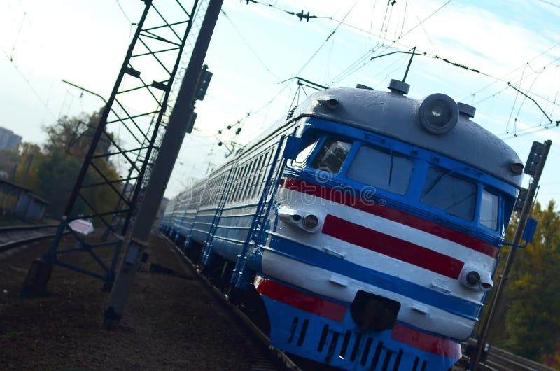 Old Soviet Electric Train with Outdated Design Moving by Rail Stock ...