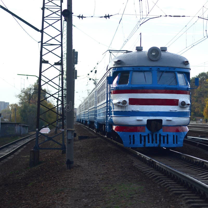 Old Soviet Electric Train with Outdated Design Moving by Rail Stock ...