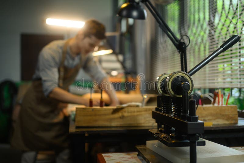 Old Special Press Machine on Wooden Table in a Local Workshop ...