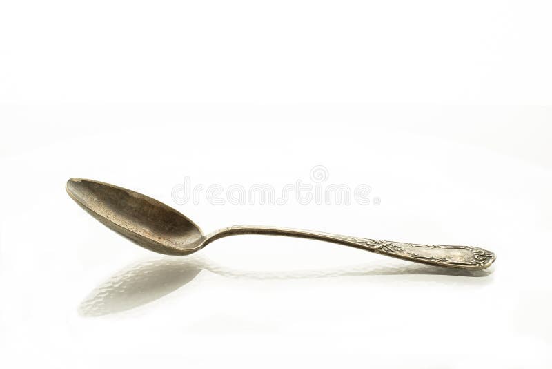 Old spoon with reflection stock photo. Image of metal - 49061200