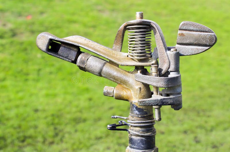 Old Sprinkler Water in the Garden Stock Photo - Image of ancient, grey ...