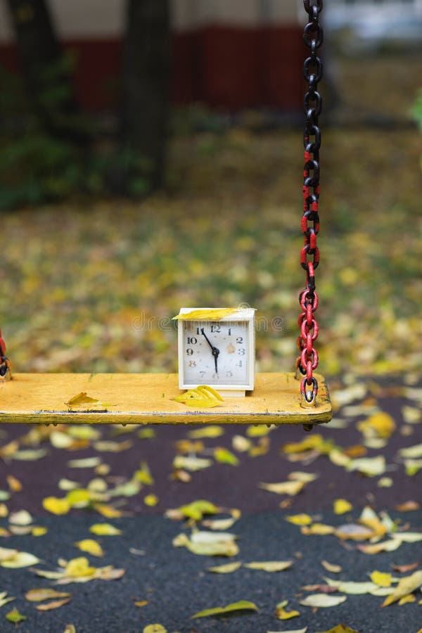 Old Square Alarm Clock on a Swing. Stock Image - Image of back, concept ...