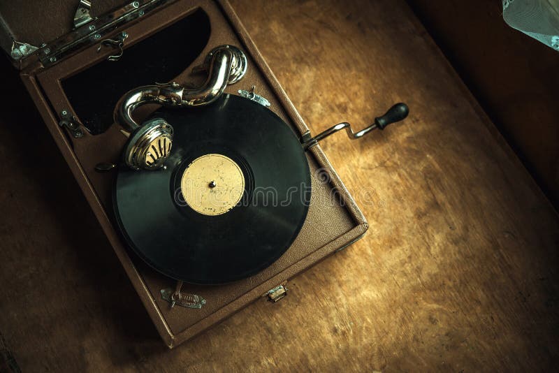 An Old Square Gramophone with a Wind-up Handle for Records. Top View ...