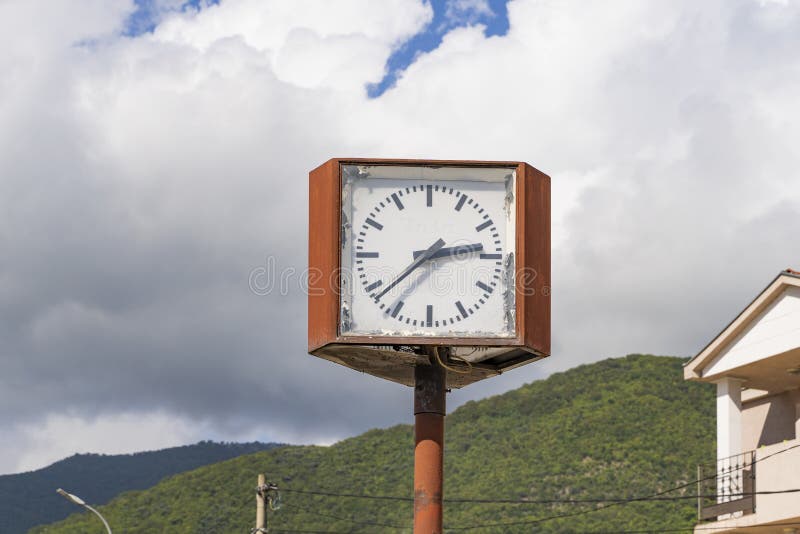 An Old Square Street Clock Rusted with Time. Street Dial Stock Photo ...