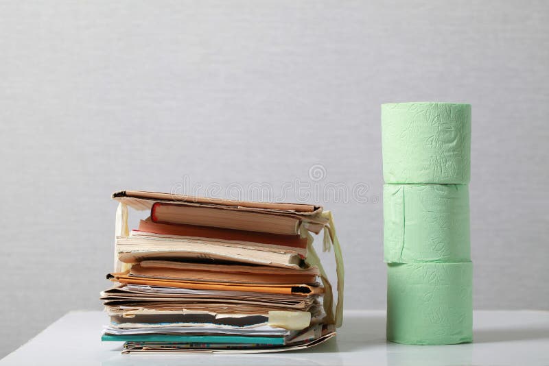 Old Stack of Waste Paper and a Roll of Toilet Paper Stock Photo - Image ...