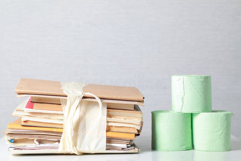 Old Stack of Waste Paper and a Roll of Toilet Paper Stock Photo - Image ...
