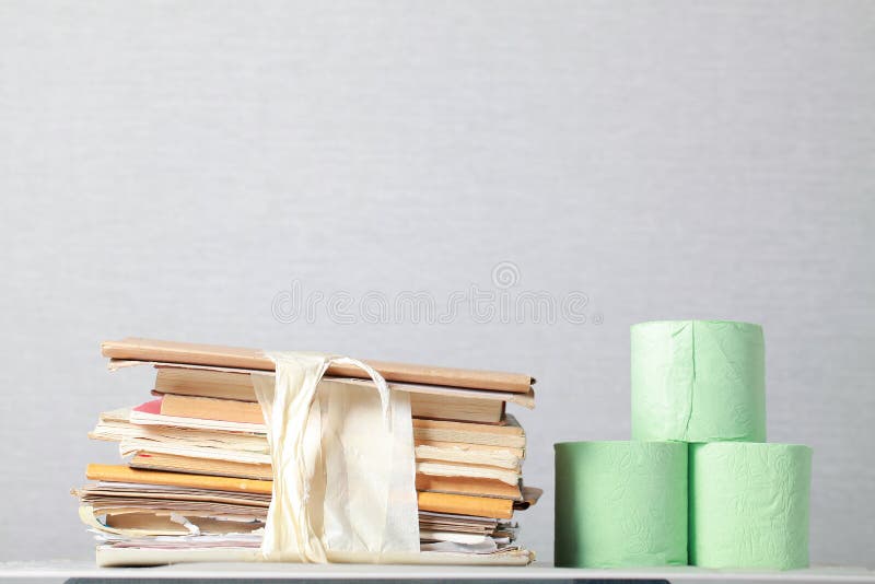 Old Stack of Waste Paper and a Roll of Toilet Paper Stock Image - Image ...