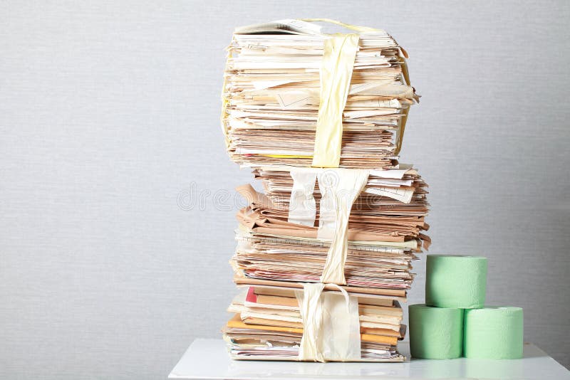 Old Stack of Waste Paper and a Roll of Toilet Paper Stock Photo - Image ...