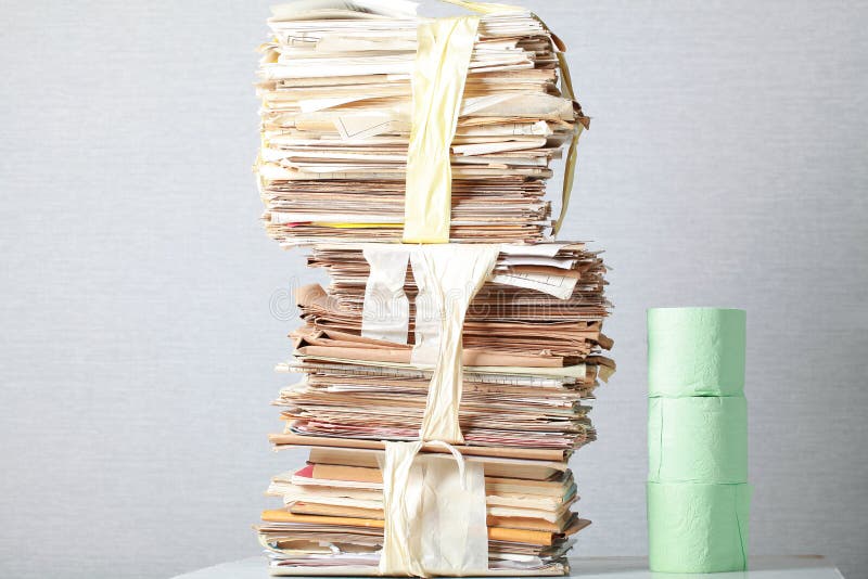 Old Stack of Waste Paper and a Roll of Toilet Paper Stock Image - Image ...