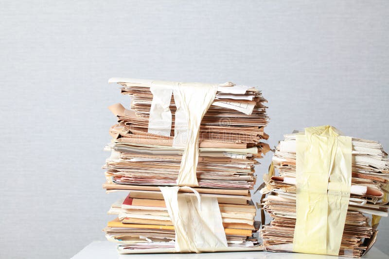 Old Stack of Waste Paper and a Roll of Toilet Paper Stock Photo - Image ...