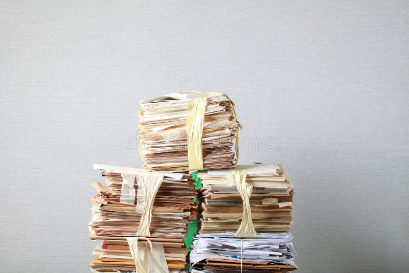 Old Stack of Waste Paper and a Roll of Toilet Paper Stock Photo - Image ...