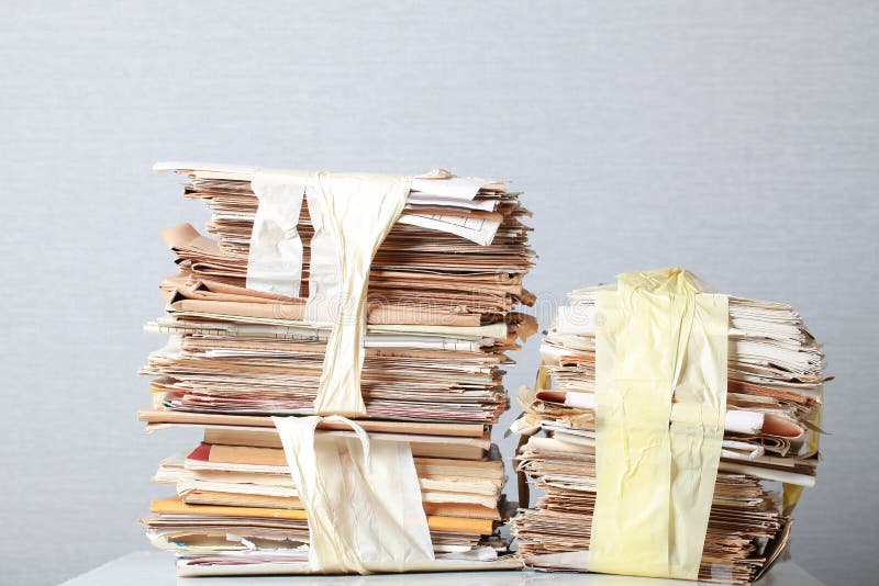 Old Stack of Waste Paper and a Roll of Toilet Paper Stock Photo - Image ...