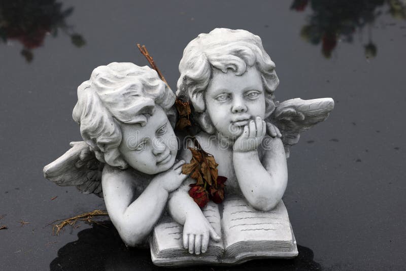 Old statues of angels stock image. Image of stone, decoration - 342238037