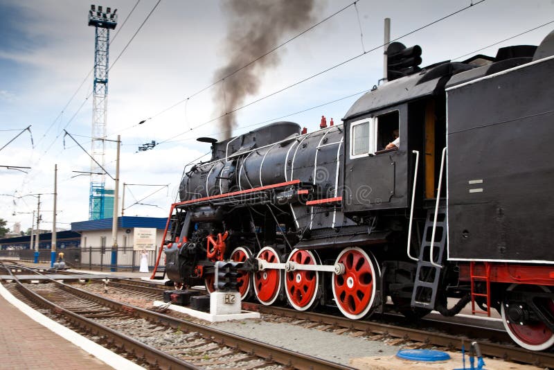 Old Steam Train is Leaving a Station Stock Photo - Image of historic ...