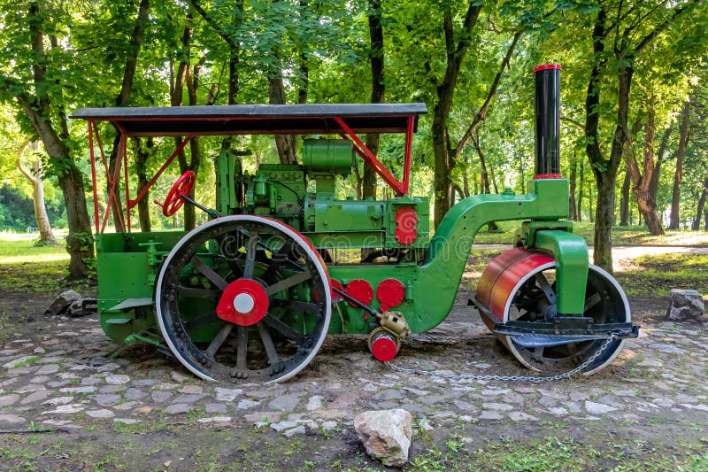Old Steamroller in Red and Green Color. Antique Steamroller Editorial ...