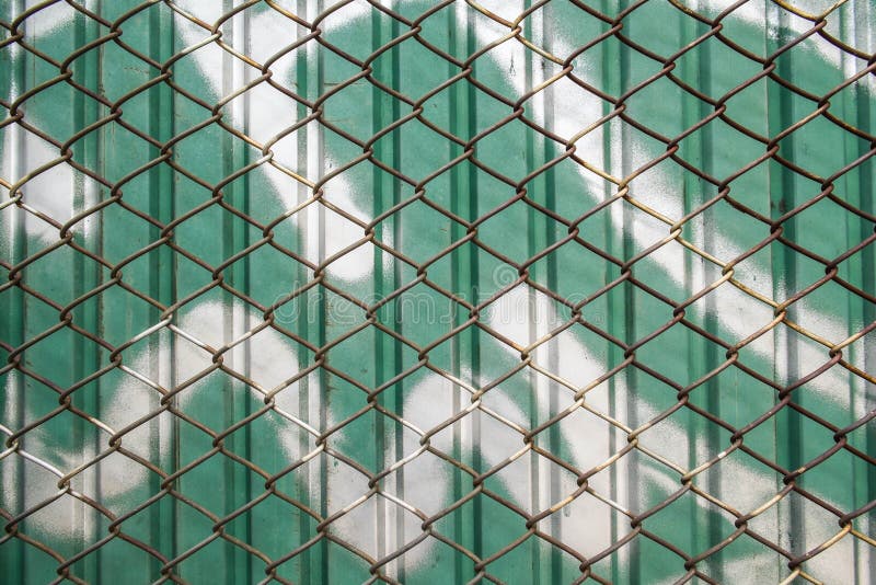 Old Steel Net with Green Zinc Wall Stock Photo - Image of jail, barrier ...