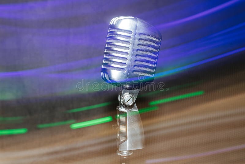 Old Steel Vintage Dynamic Stage Microphone with Motion Blurred Lights ...