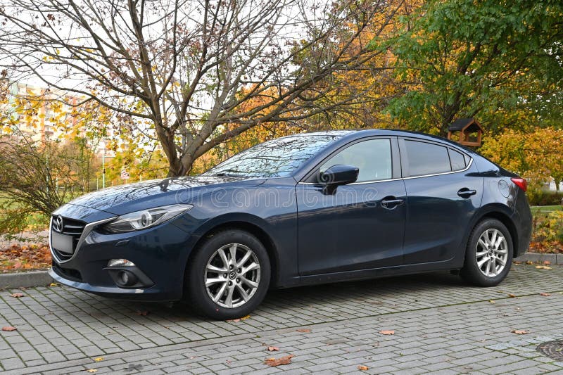 Old but Still Elegant Dark Blue Mazda 3 Sedan Second Generation Four ...