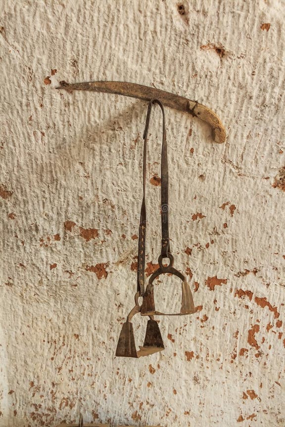 Old stirrup on wall stock photo. Image of country, farm - 84796376