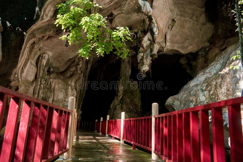 Old Stone Bat Cave in the Rock. Tourist Attraction Stock Image - Image ...