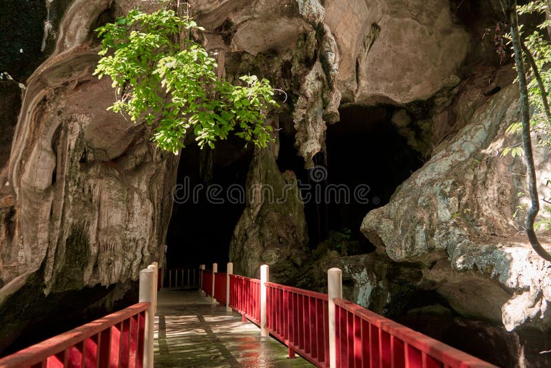 Old Stone Bat Cave in the Rock. Tourist Attraction Stock Image - Image ...