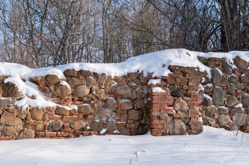 An Old Stone and Brick Wall Covered in Snow Stock Image - Image of ...