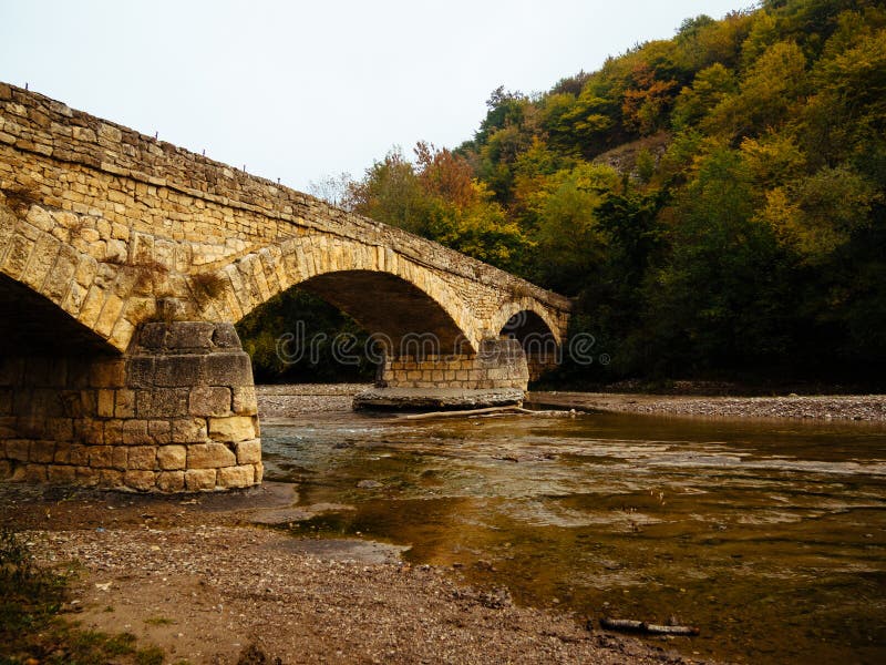 Old Stone Bridge. Autumn Trees in the Mountains Stock Image - Image of ...