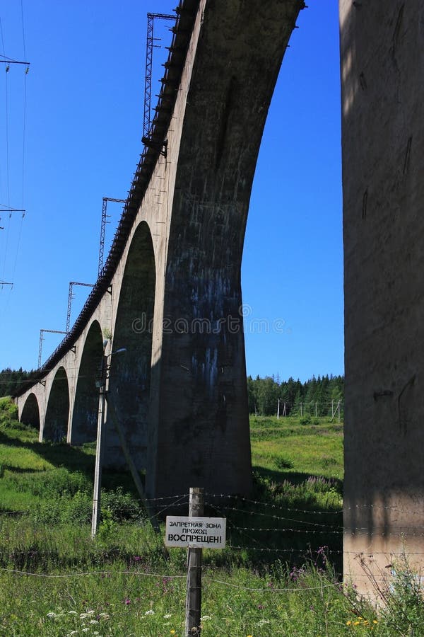 An Old Stone Bridge Passes Over the Road Editorial Photography - Image ...
