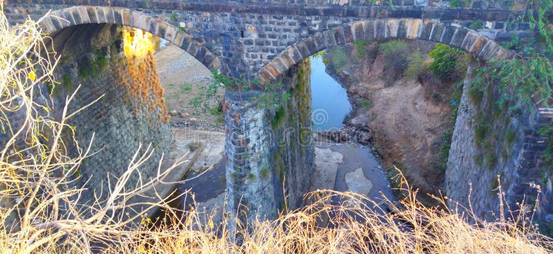 Old Stone Bridge on River in India Stock Image - Image of light, bridge ...