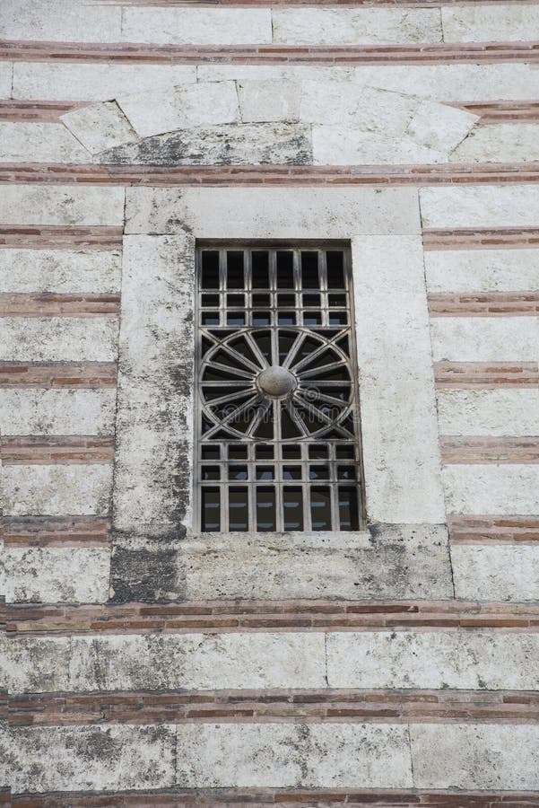 Old Stone Building with Windows and Grilles. Stock Photo - Image of ...