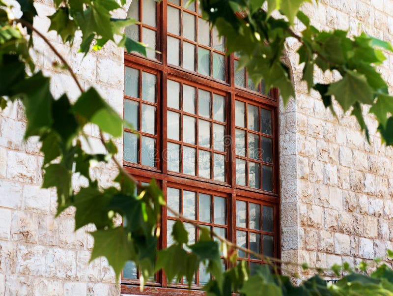 Old Stone-faced Building with Wooden Window Frames Stock Image - Image ...