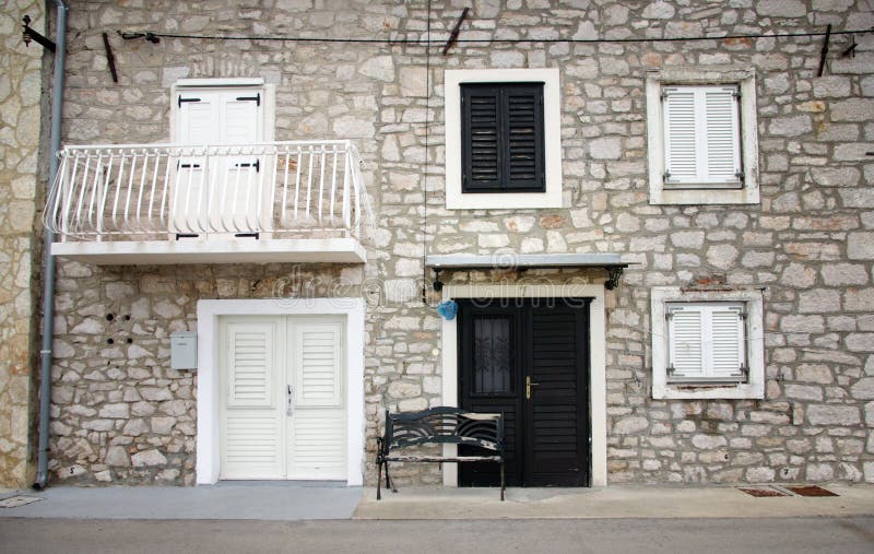 Old Stone House with Shutters in Front View Stock Photo - Image of ...