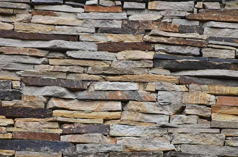 Old stone layered wall stock image. Image of structure - 65910293