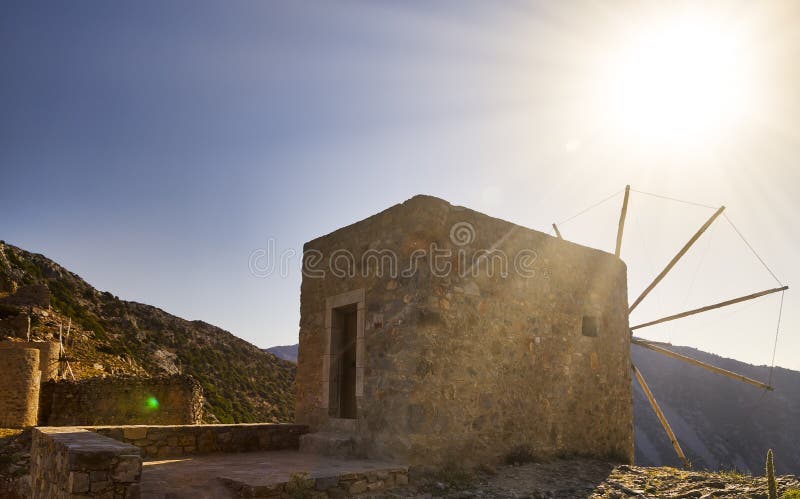 An Old Stone Mill on Top of a Mountain, Against the Backdrop of a ...