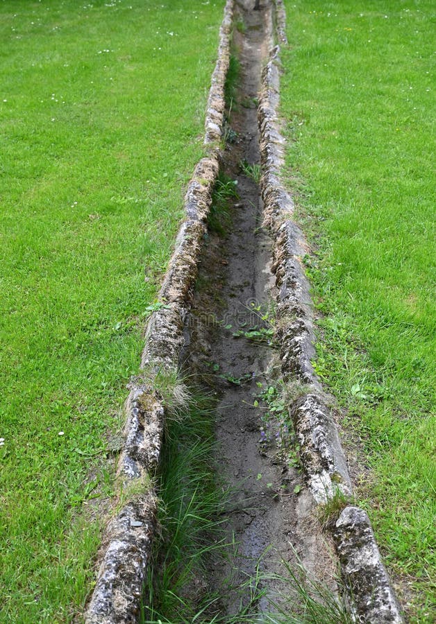Old Stone Paved Road Water Ditch Stock Image - Image of canal, rain ...