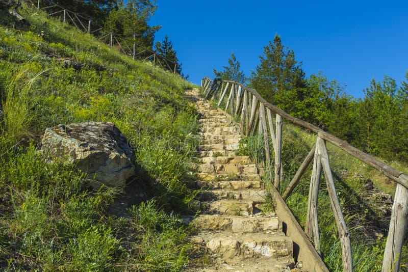 Old stone stairs on a hill stock image. Image of garden - 255890839