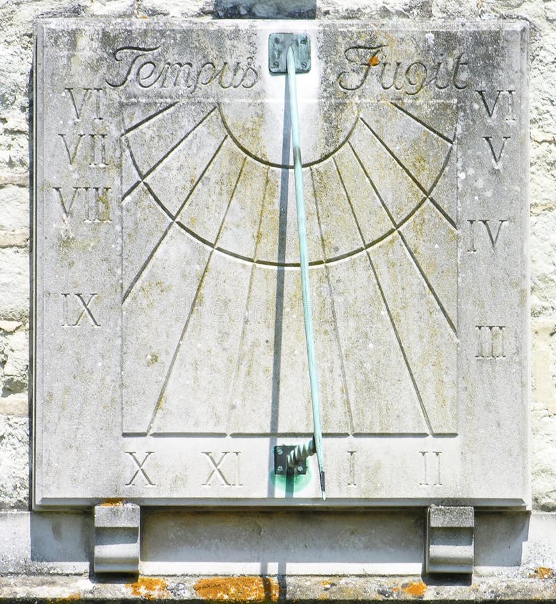 Old stone sundial on wall stock image. Image of ancient - 214140867