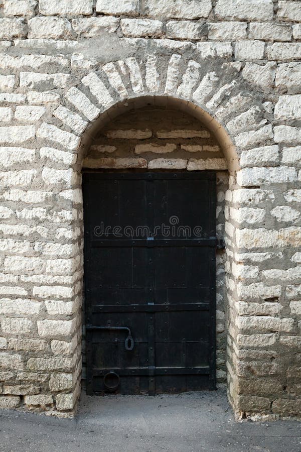 Old Stone Wall and Black Door, Background Texture Stock Photo - Image ...