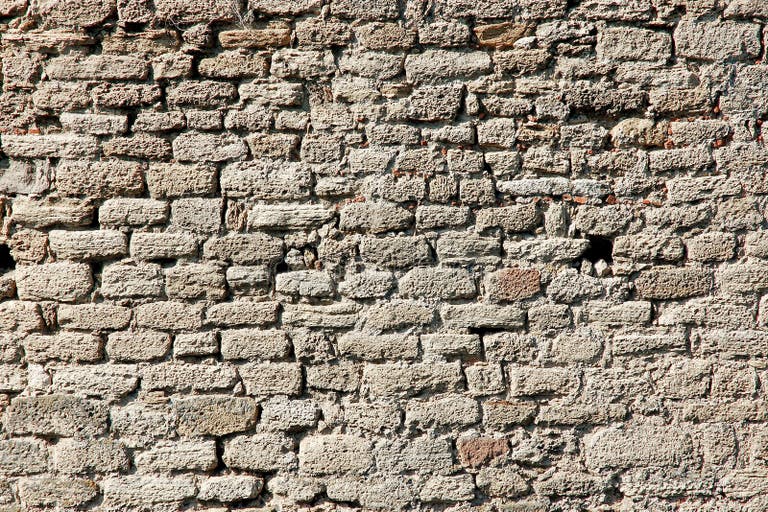 Old Stone Wall Built of Limestone Bricks Stock Photo - Image of stone ...