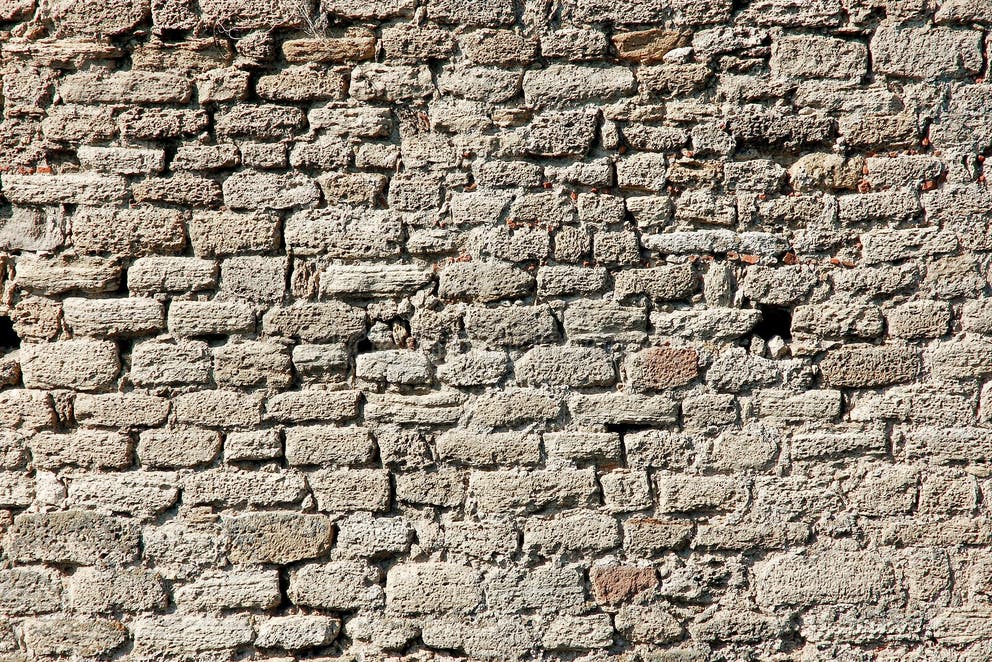 Old Stone Wall Built of Limestone Bricks Stock Photo - Image of stone ...