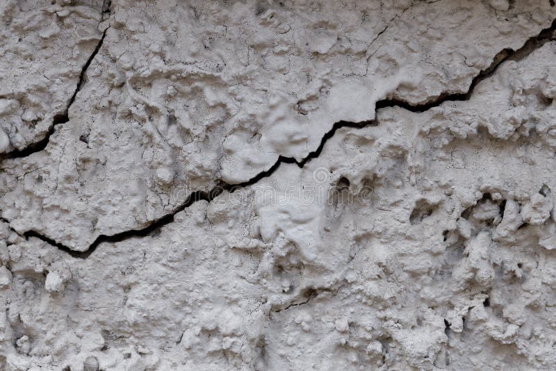 Old stone wall with cracks stock image. Image of brick - 257276153